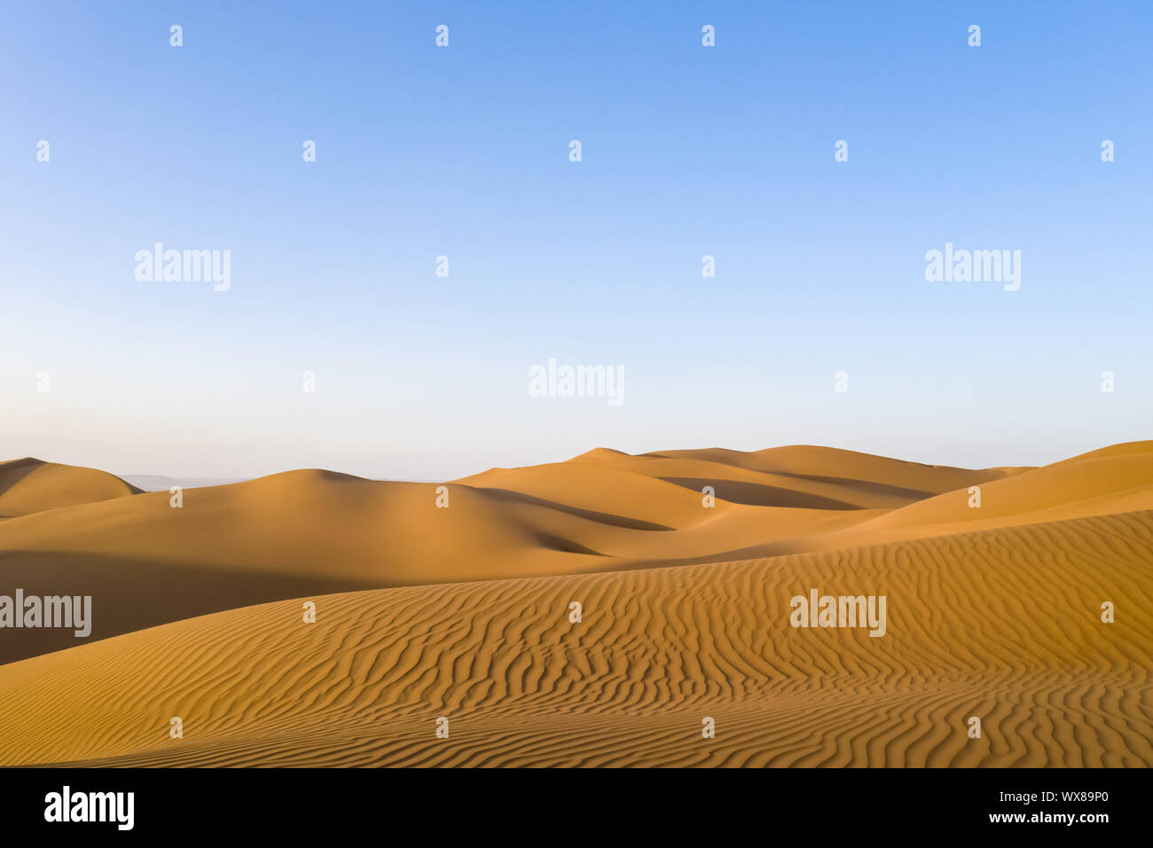 Desert sand dunes at sunset hi-res stock photography and images - Alamy