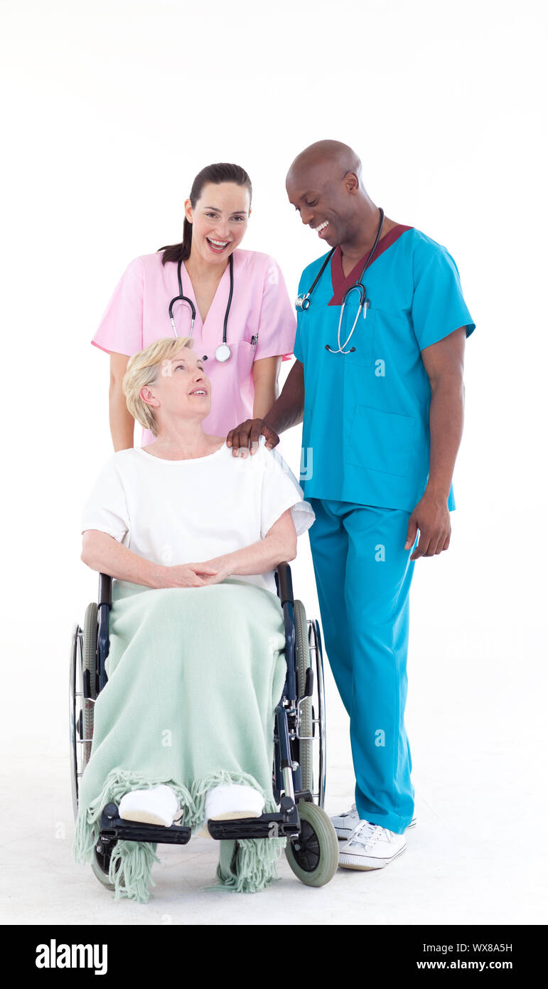Female nurse taking disabled Cut Out Stock Images & Pictures - Alamy