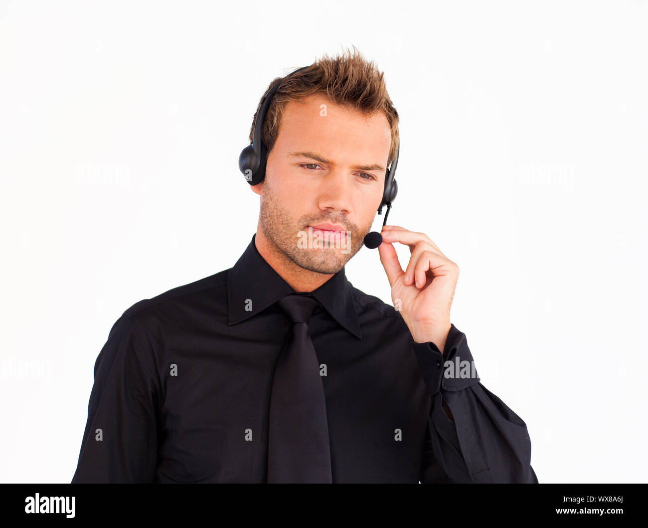 Thoughtful customer service representative man against white background ...