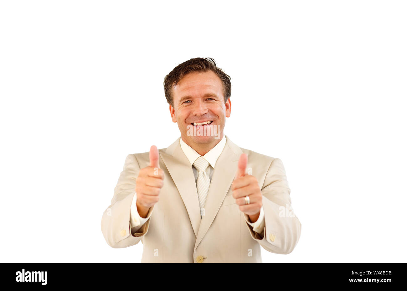Confident business manager smiling at the camera with thumbs up Stock ...