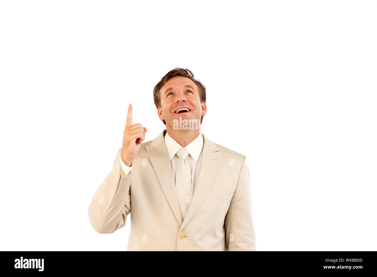 Senior leader looking upwards and showing finger upwards Stock Photo - Alamy