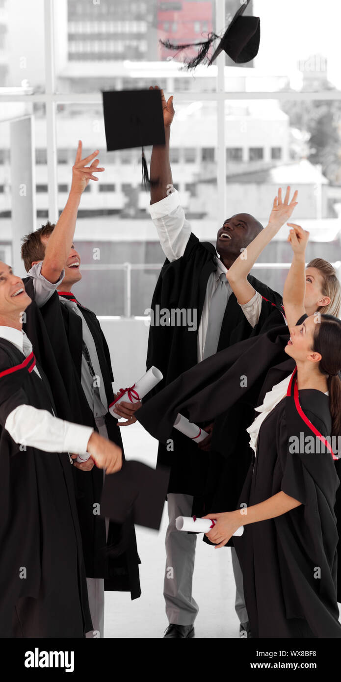 Young Group of people celebrating their Graduation Stock Photo - Alamy