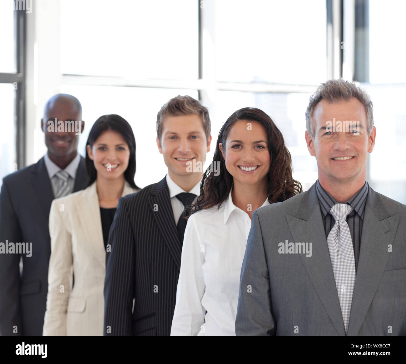 Smiling senior busienss leader Stock Photo - Alamy