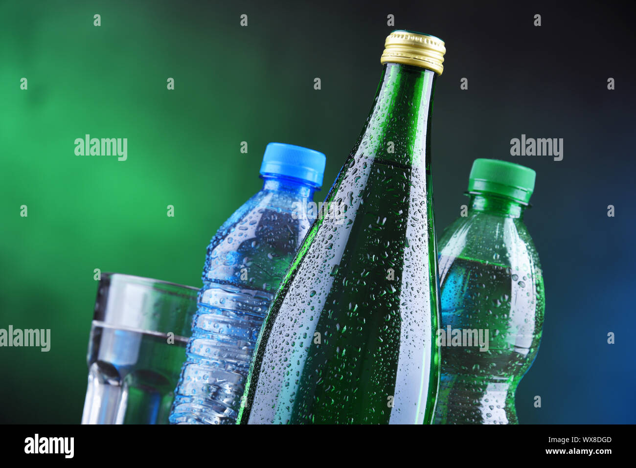 Composition with different sorts of bottles containing mineral water ...