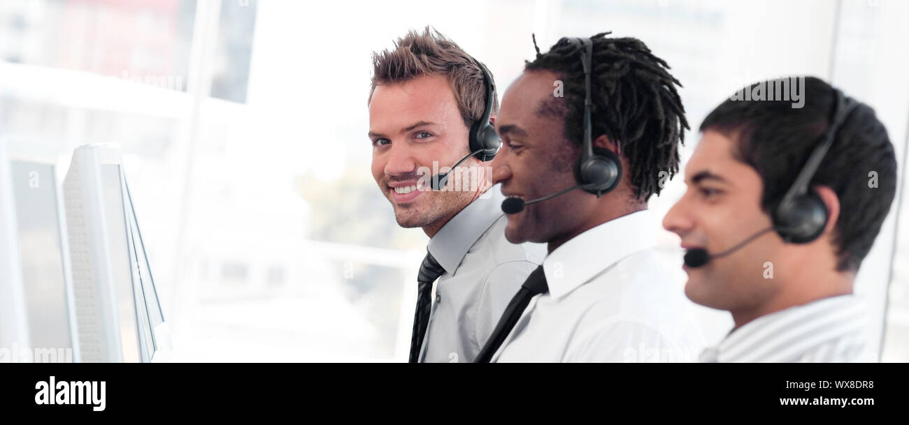 International business team in a call center wearing headset Stock ...