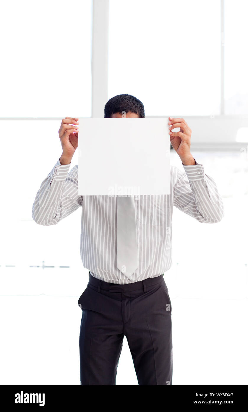 Businessman showing a big white card in front of his face Stock Photo ...
