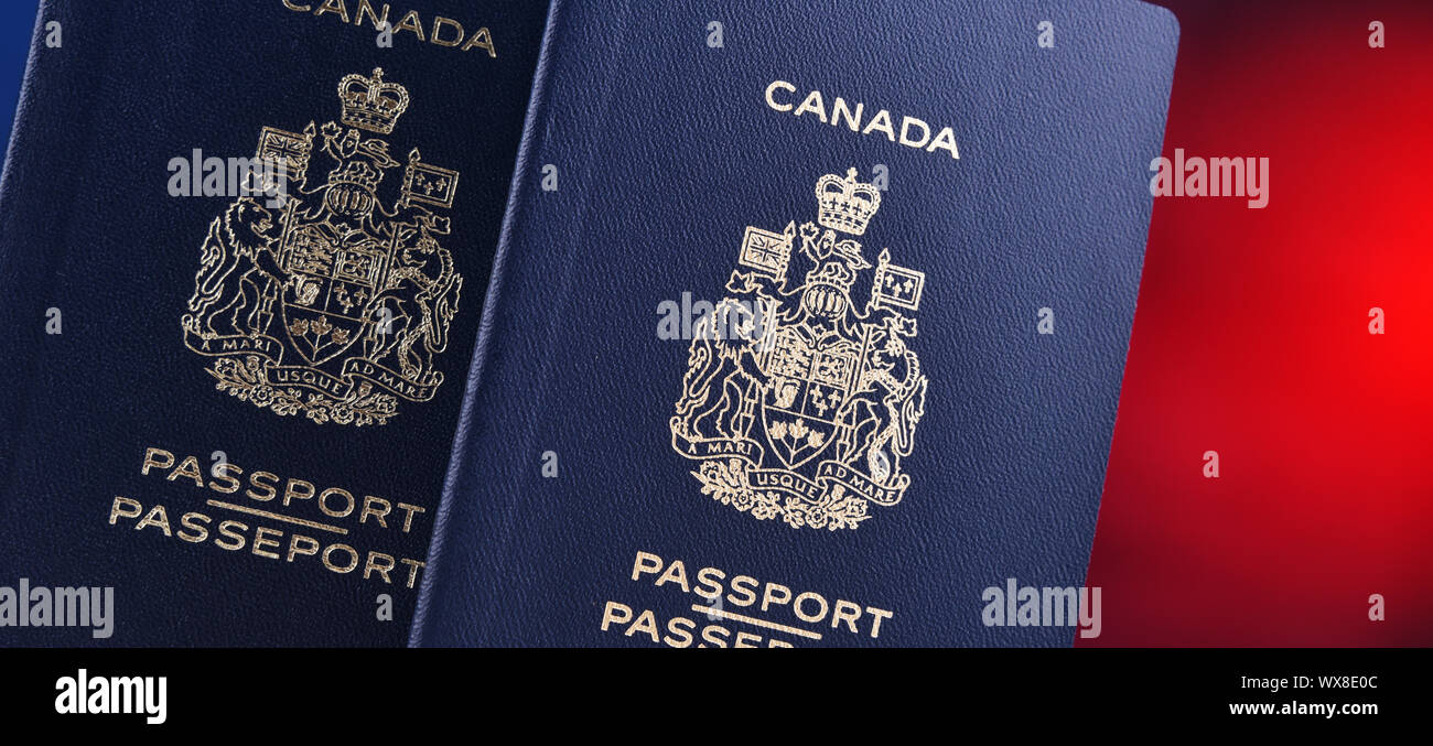 Composition with two Canadian passports Stock Photo - Alamy