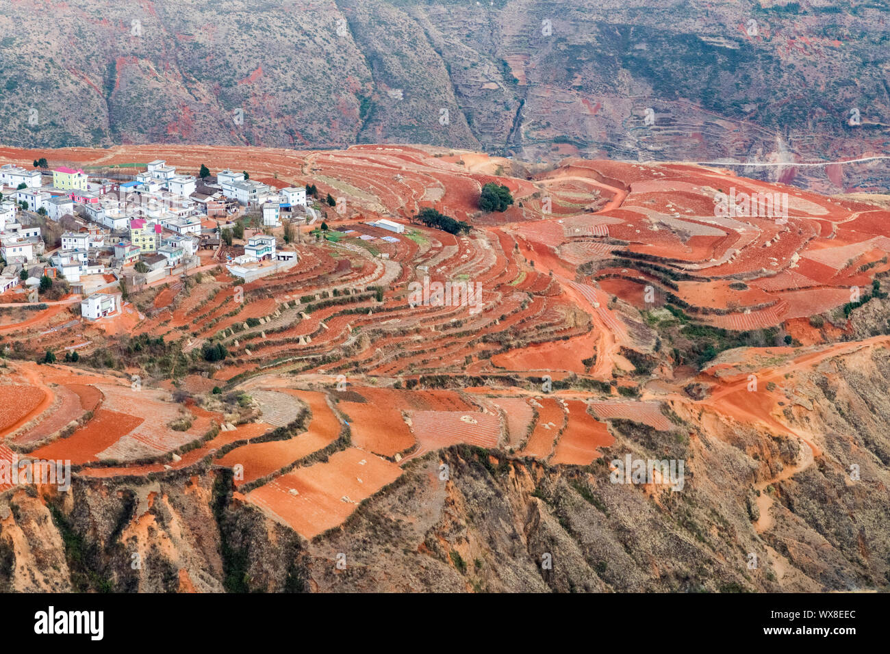village on red land Stock Photo - Alamy