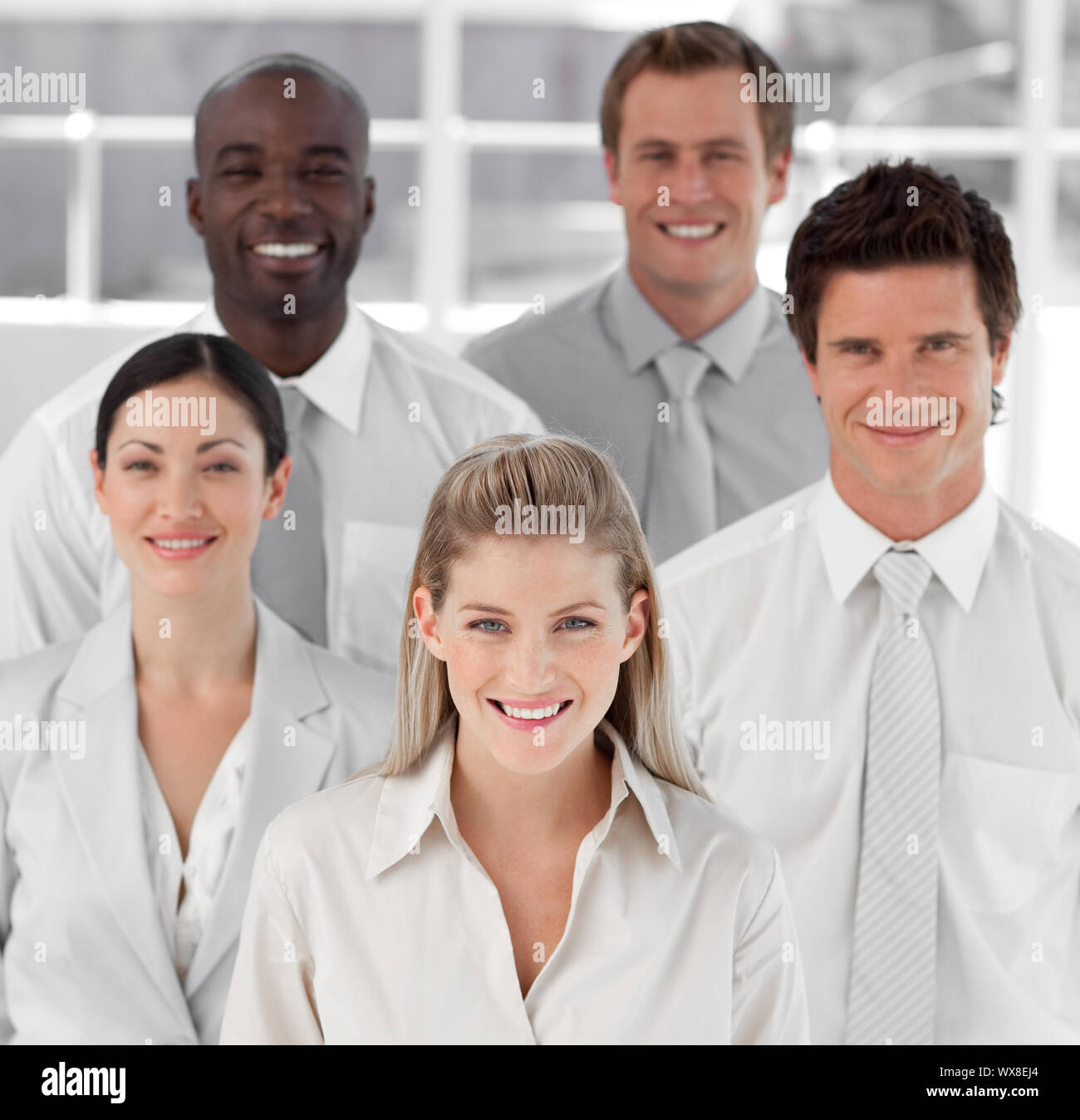 Business Group of Five people looking at camera and Smiling Stock Photo ...