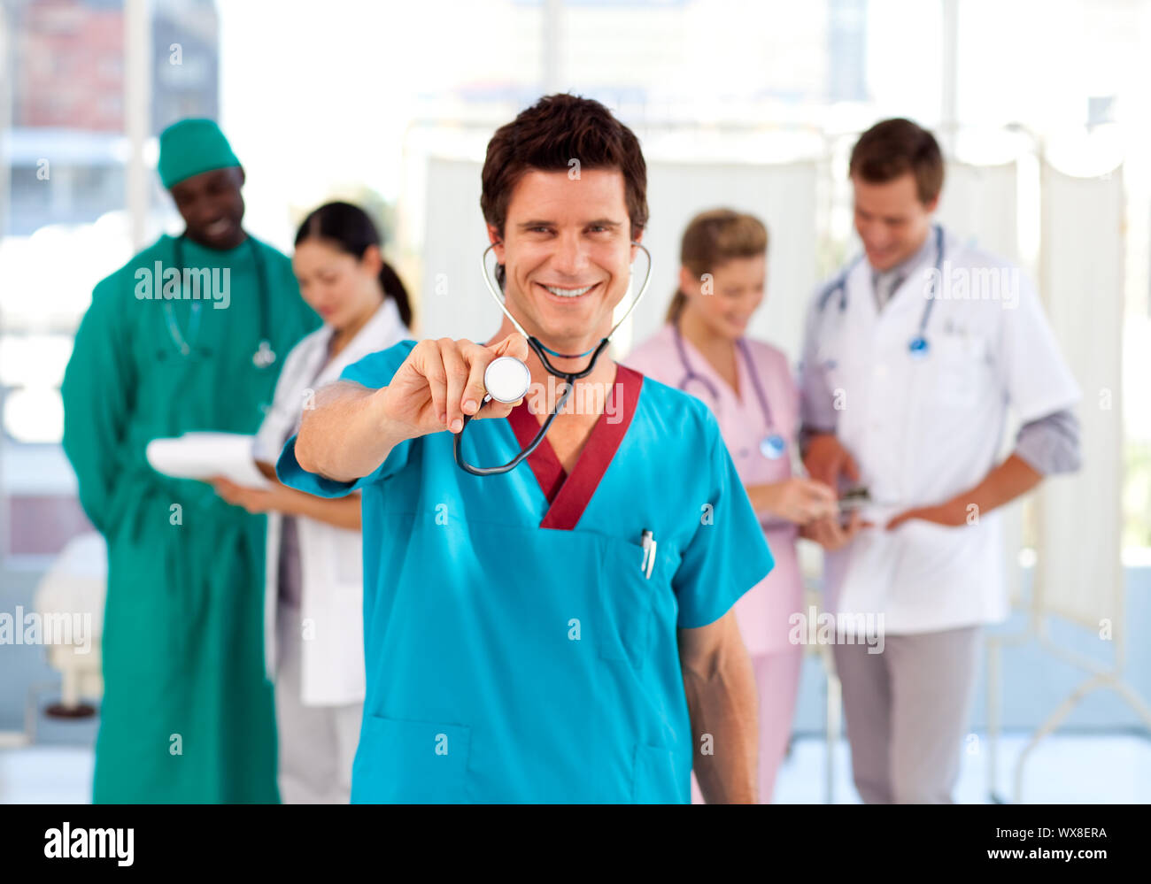 Medical team working together in a hospital Stock Photo - Alamy