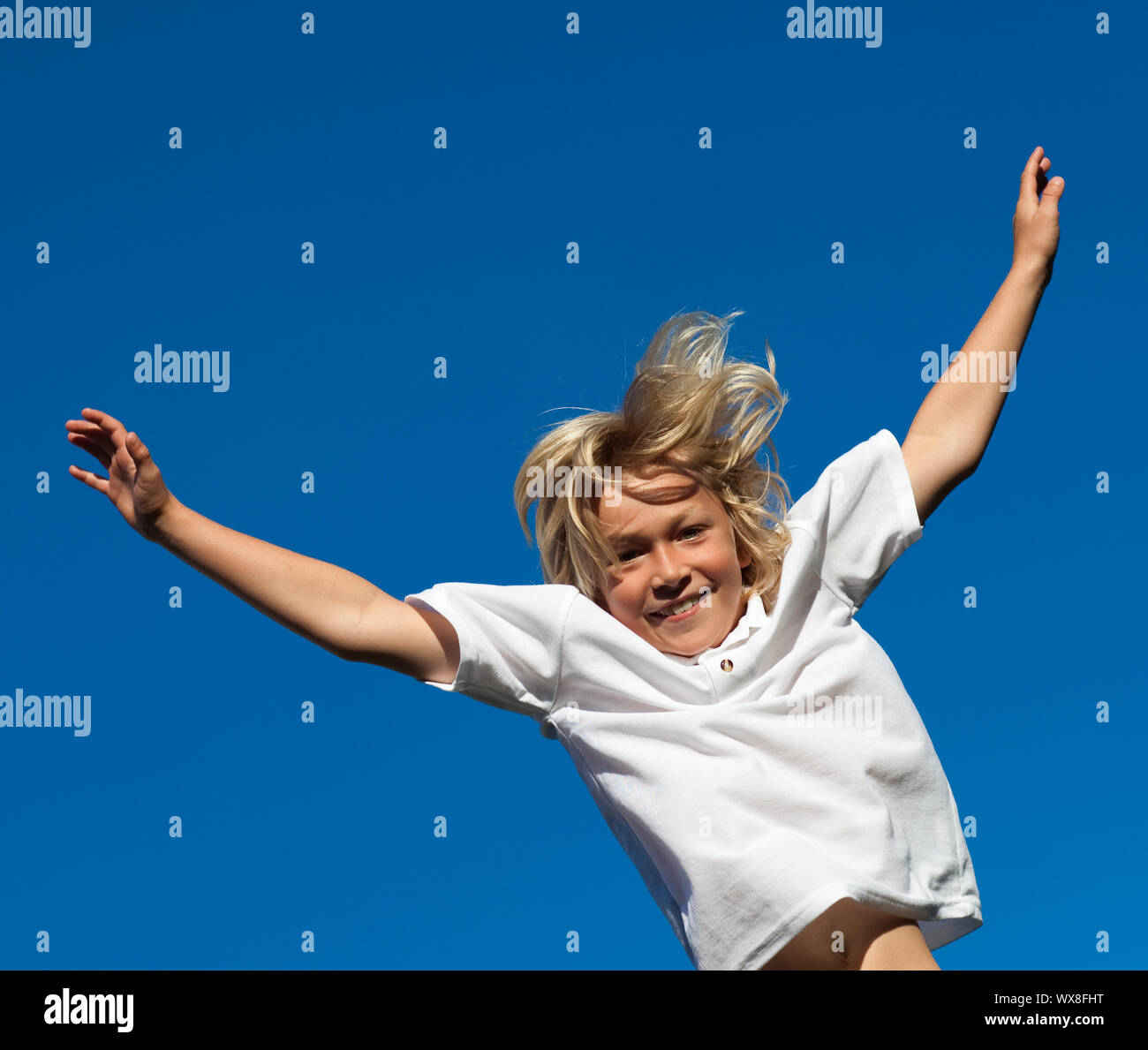 Adorable little boy having fun Stock Photo - Alamy