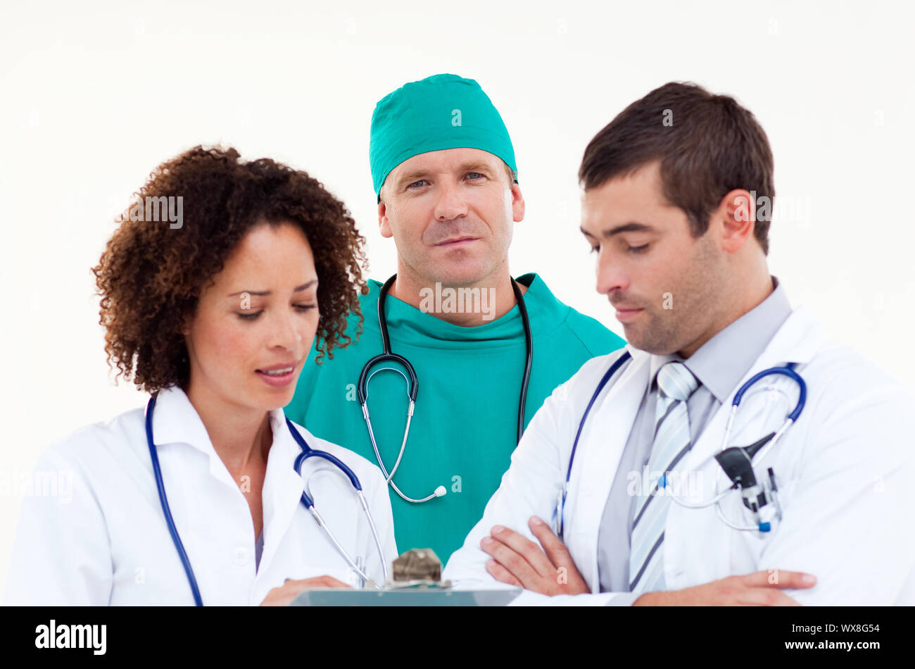 Group of positive doctors looking at the camera Stock Photo - Alamy