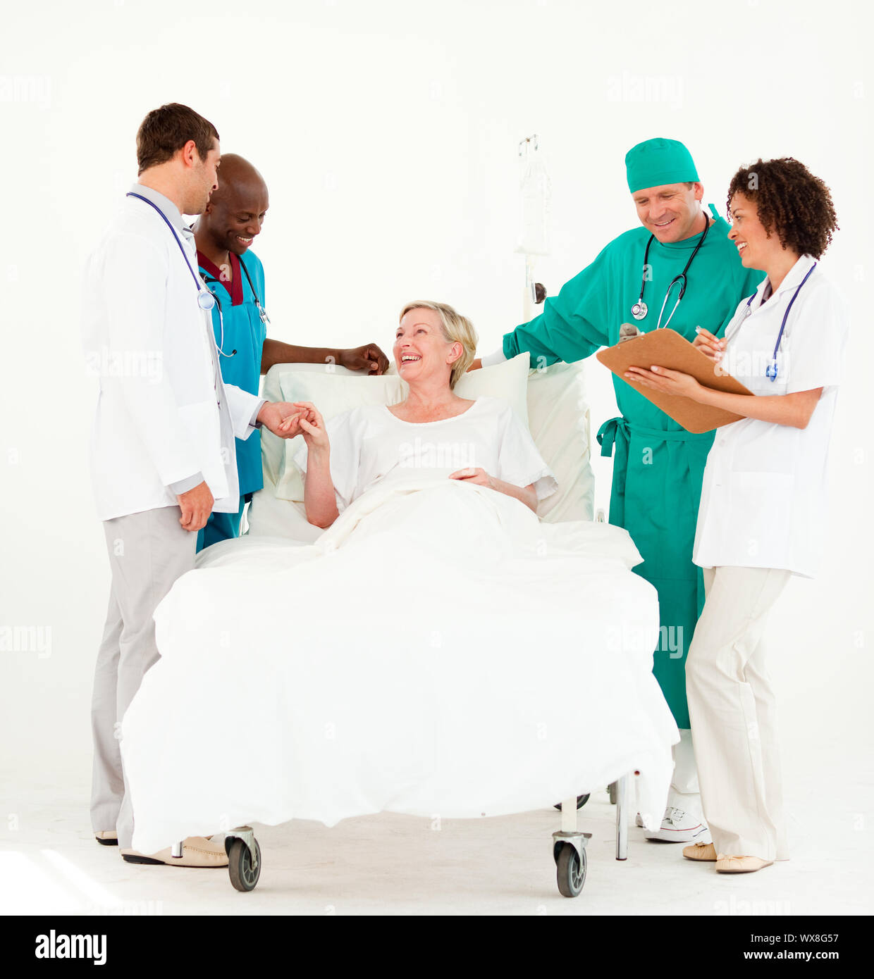 Doctors examining sick man hi-res stock photography and images - Alamy