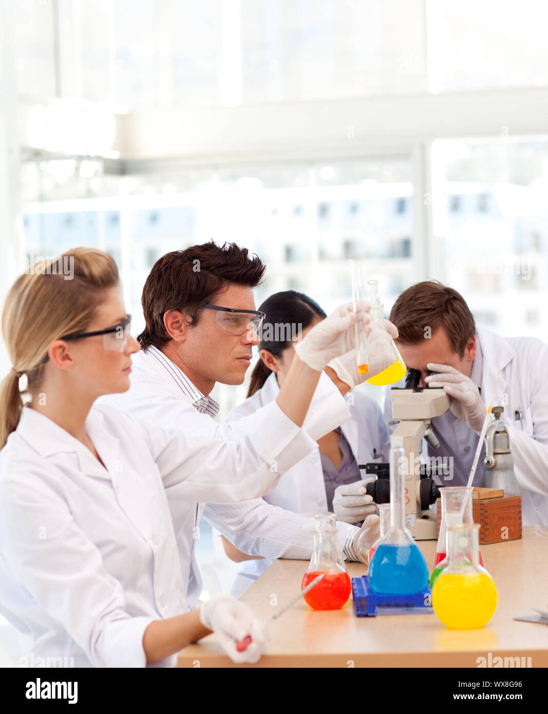 Students learning science in a laboratory Stock Photo - Alamy
