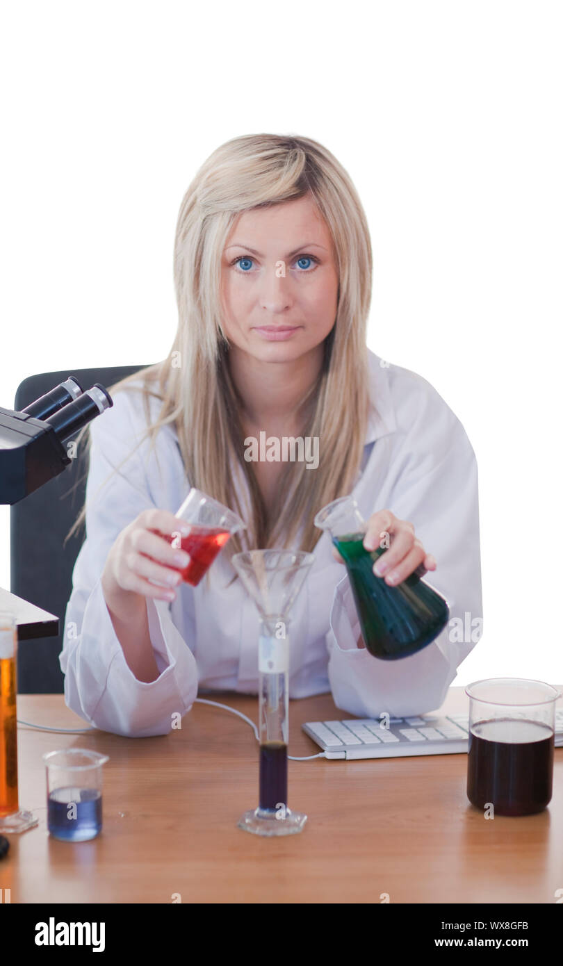 Woman scientist conducting experiment on lab Stock Photo - Alamy
