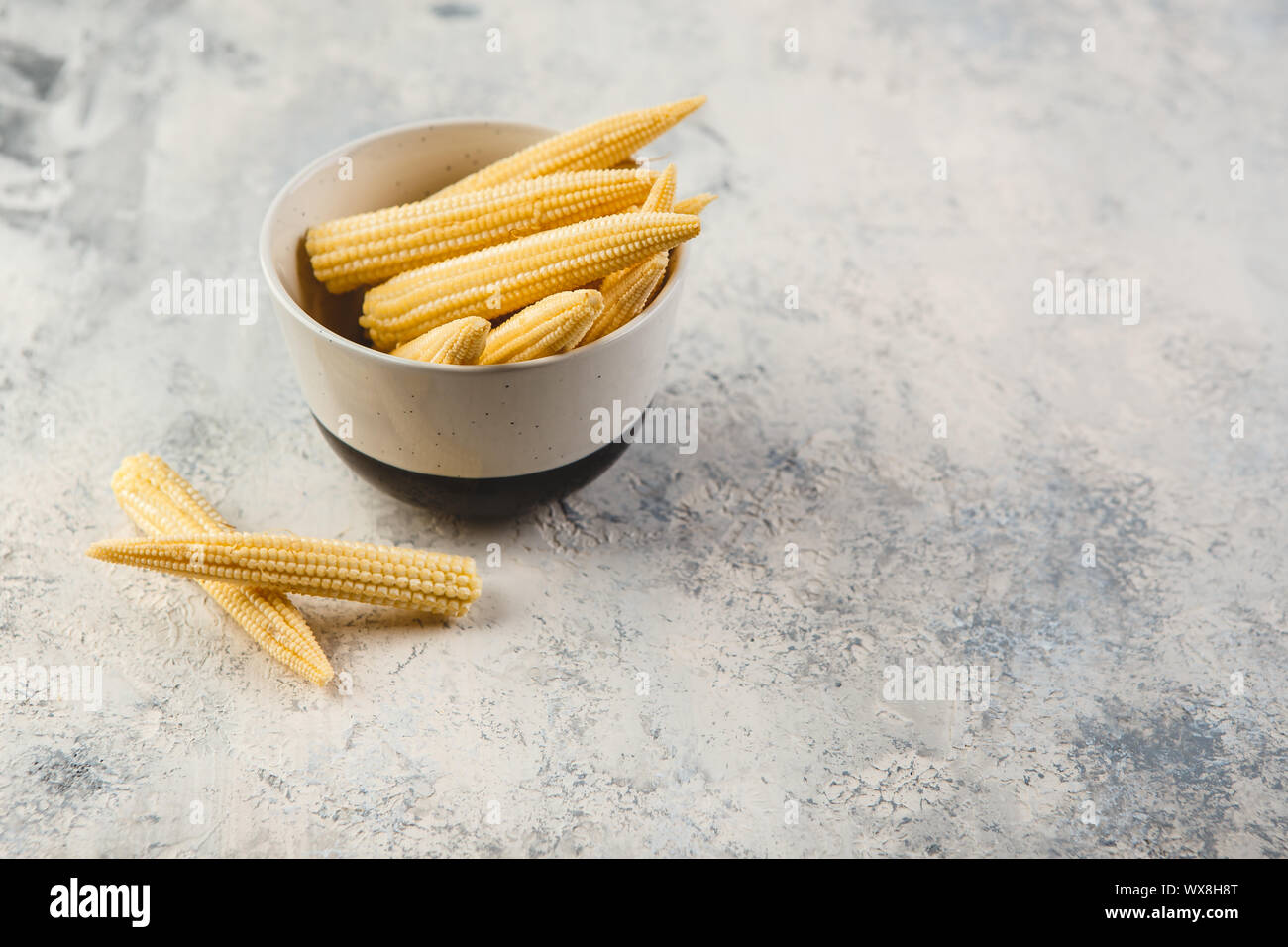 Fresh young baby corn Stock Photo - Alamy