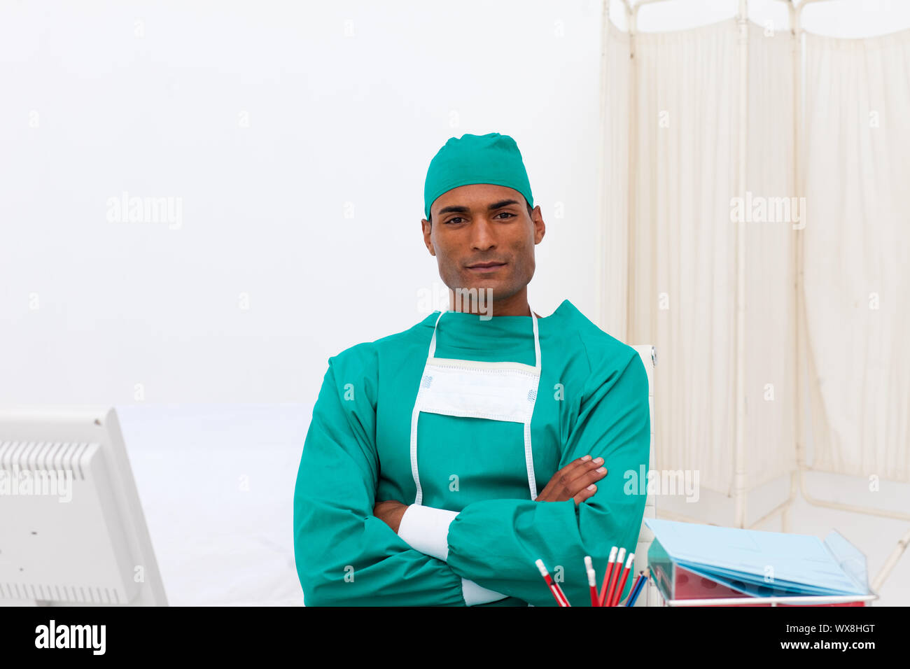 Portrait of a serious surgeon at his desk in the hospital Stock Photo ...