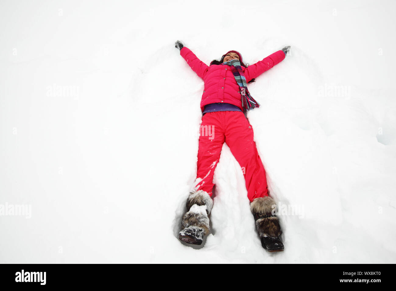 winter woman lay on snow Stock Photo - Alamy