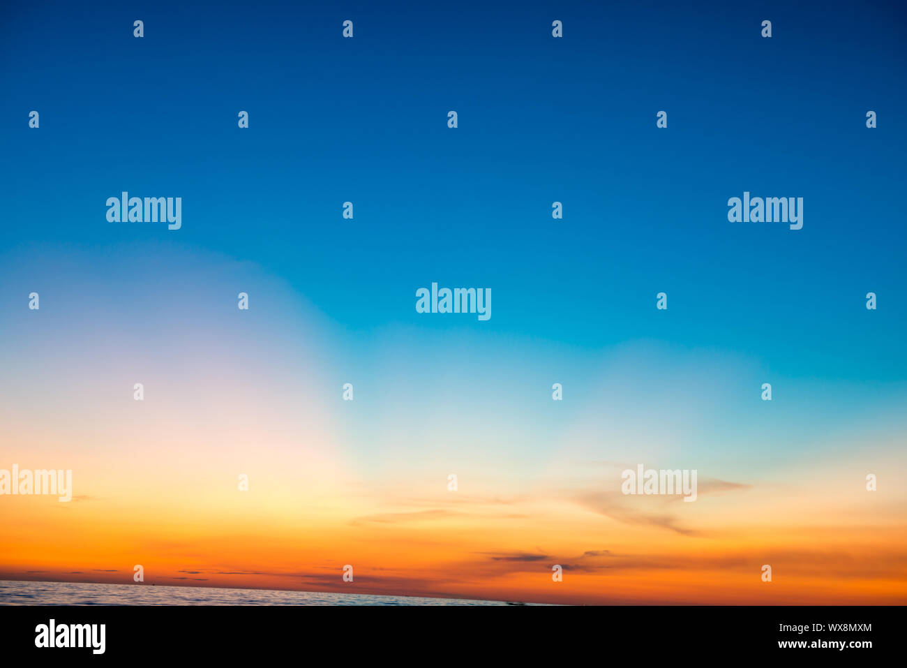 Dramatic sunset sky with golden rays. Nature background Stock Photo - Alamy