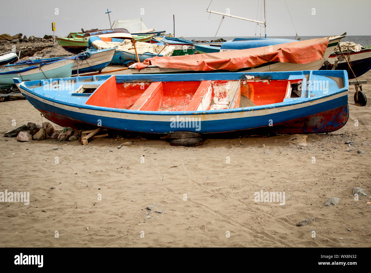 Old boats on the shore Stock Photo - Alamy