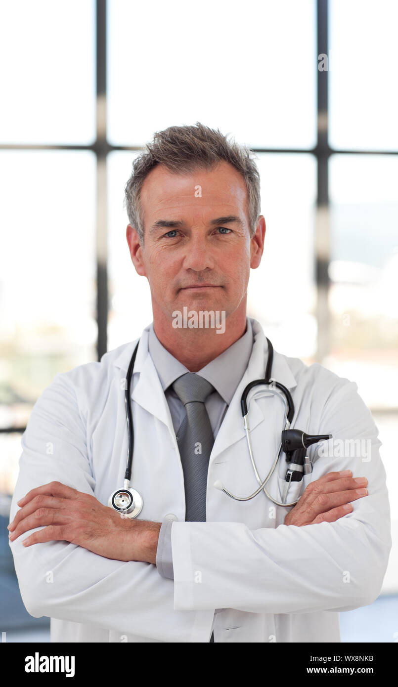 Assertive doctor in a hospital looking at camera Stock Photo - Alamy