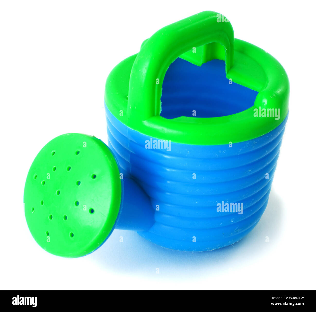 Toy blue plastic watering-can on the white background Stock Photo - Alamy