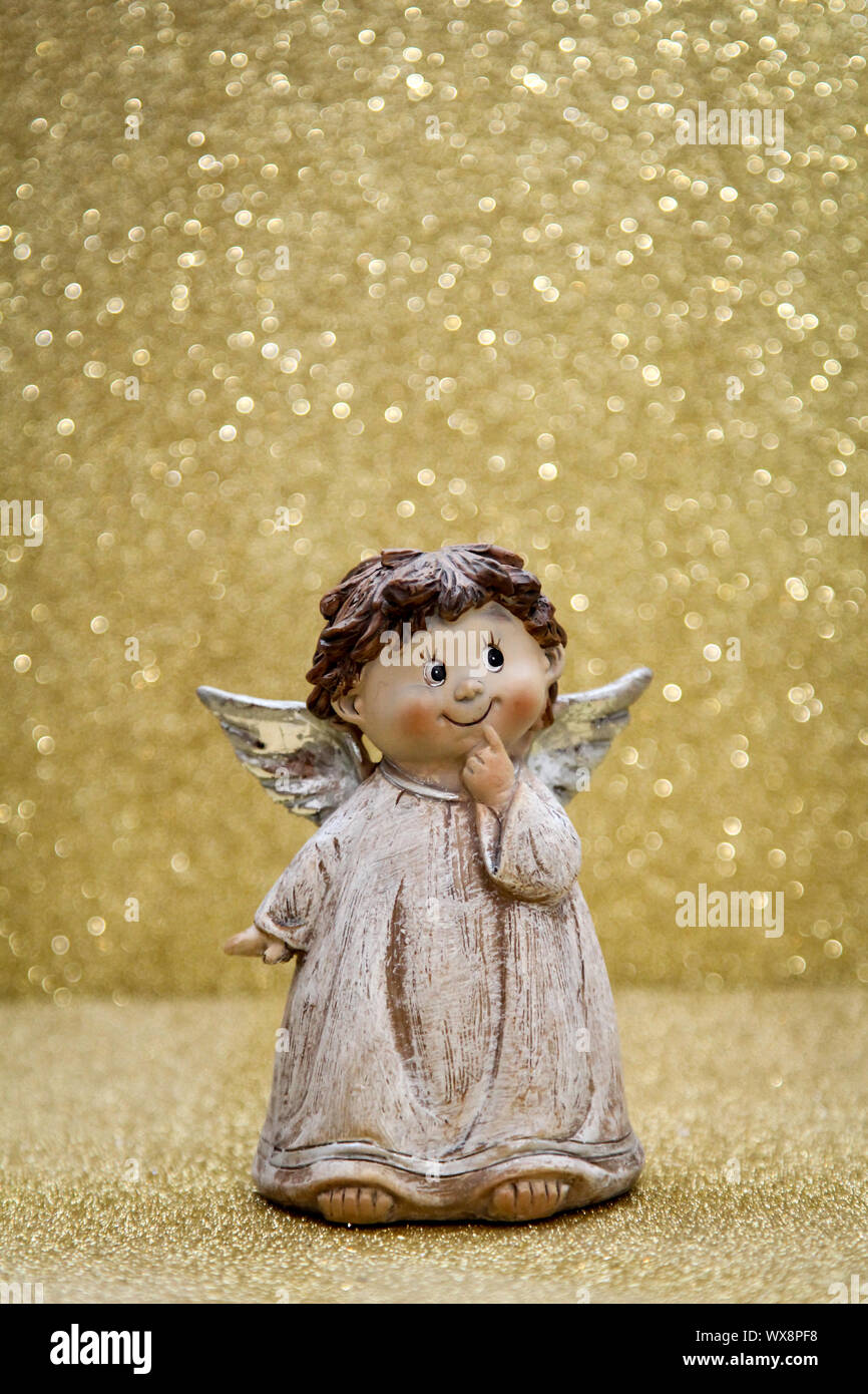Angel and glitter Stock Photo - Alamy