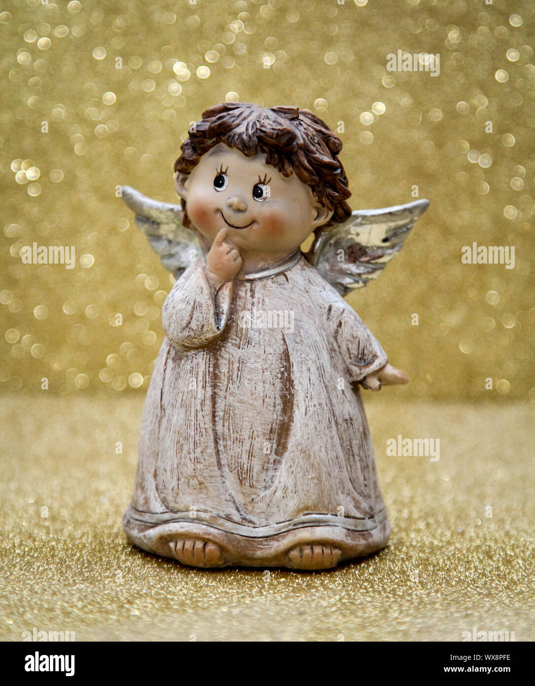 Angel and glitter Stock Photo - Alamy