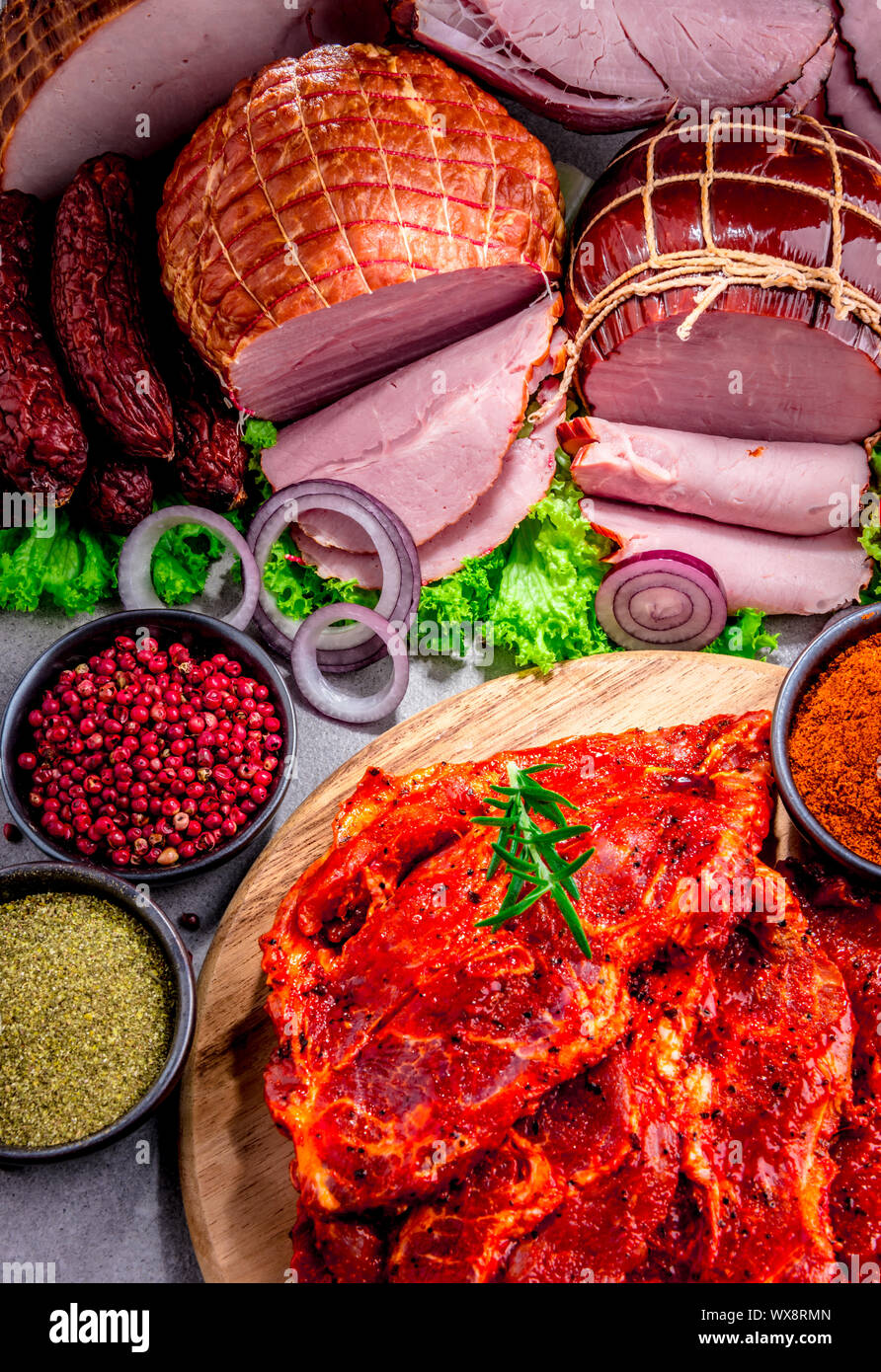 Composition with assorted meat products including ham Stock Photo - Alamy
