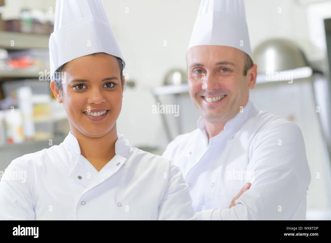 happy male and female chef Stock Photo - Alamy