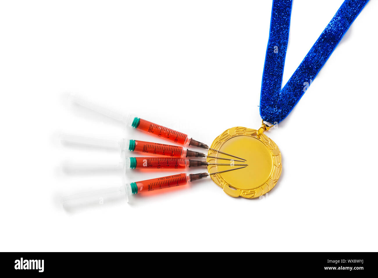 Gold medal and syringes Stock Photo - Alamy