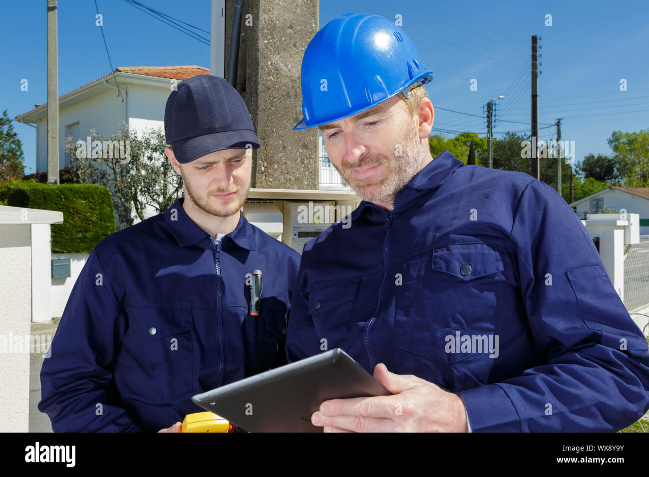 Apprentice instructor on building site hi-res stock photography and ...