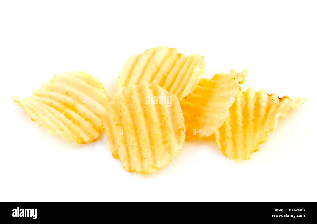 Several potato chips isolated on white background Stock Photo - Alamy