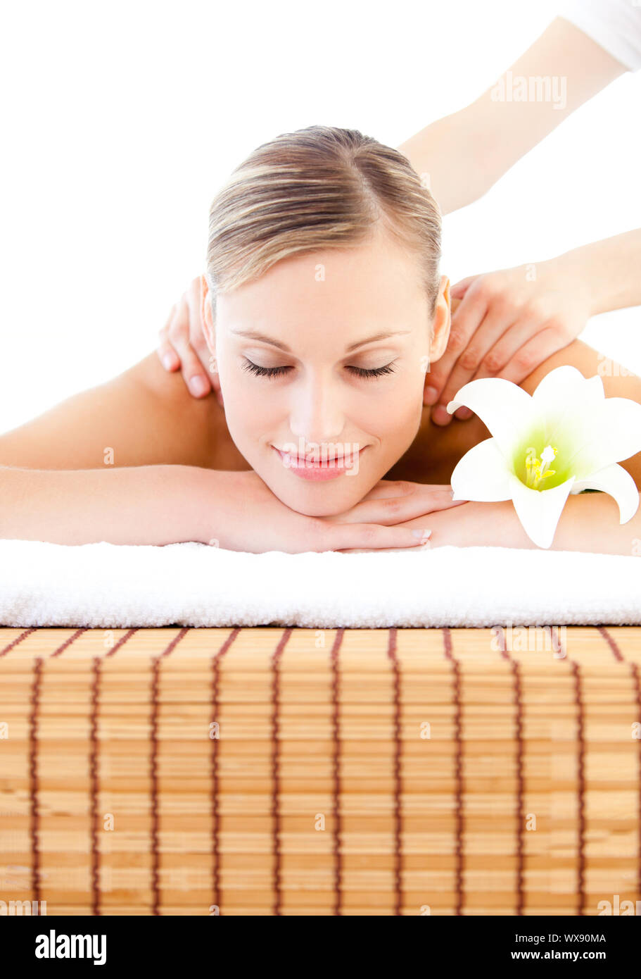 Portrait Of An Attractive Young Woman Receiving A Massage In A Spa