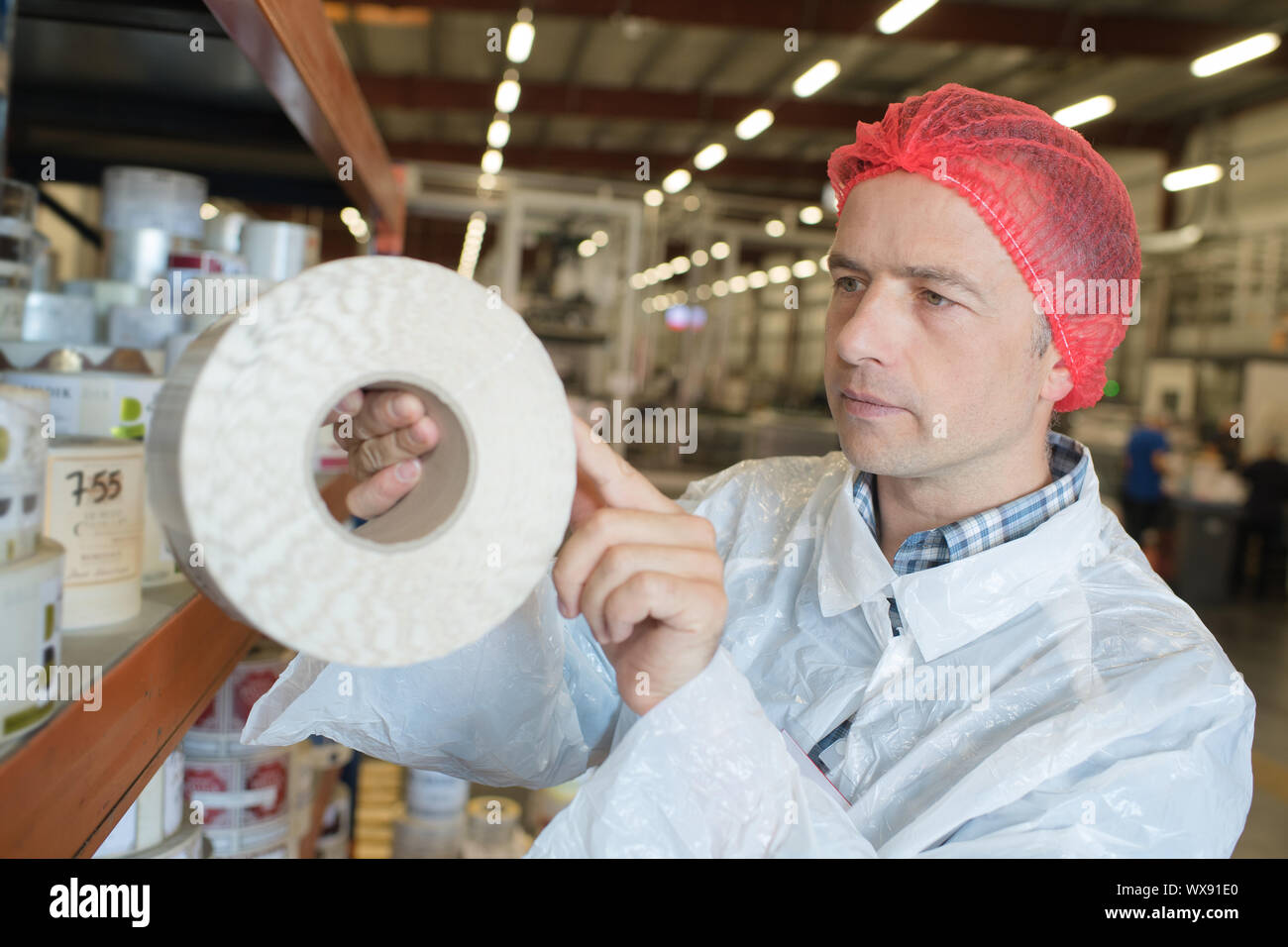 engineer in lab coats working in a factory Stock Photo - Alamy