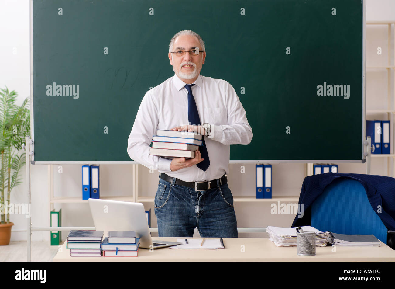 Male teacher presenting school test hi-res stock photography and images ...