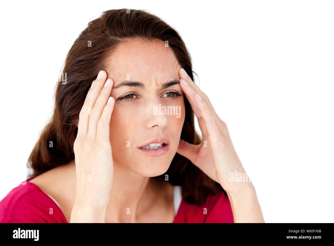 Sick hispanic woman having a headache against a white background Stock ...