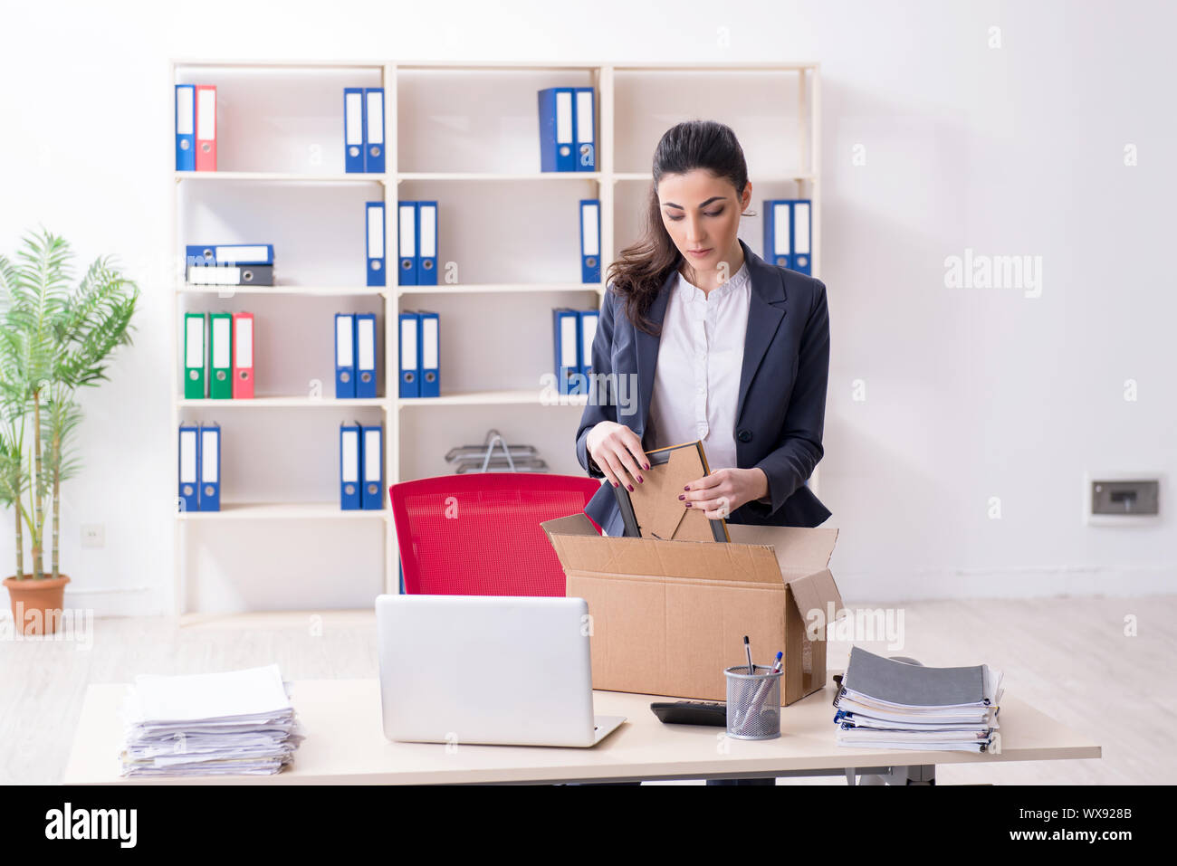 Young female employee being fired from her work Stock Photo - Alamy