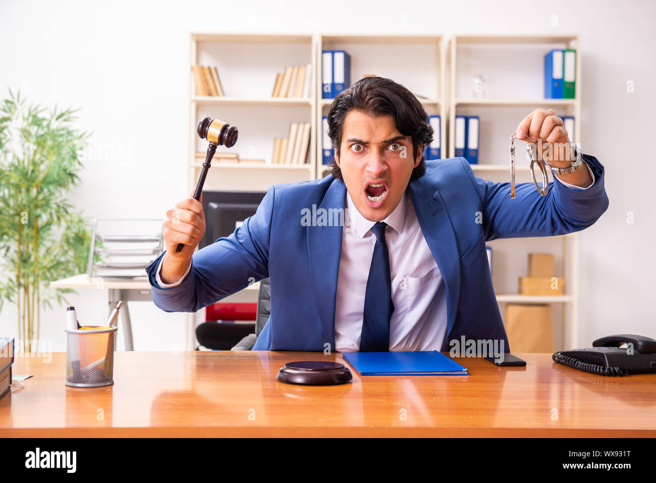 Man court hand cuffs hi-res stock photography and images - Alamy