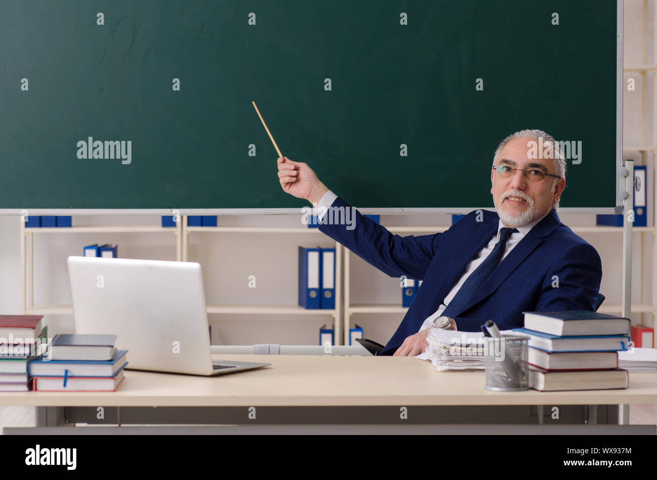 Male teacher presenting school test hi-res stock photography and images ...