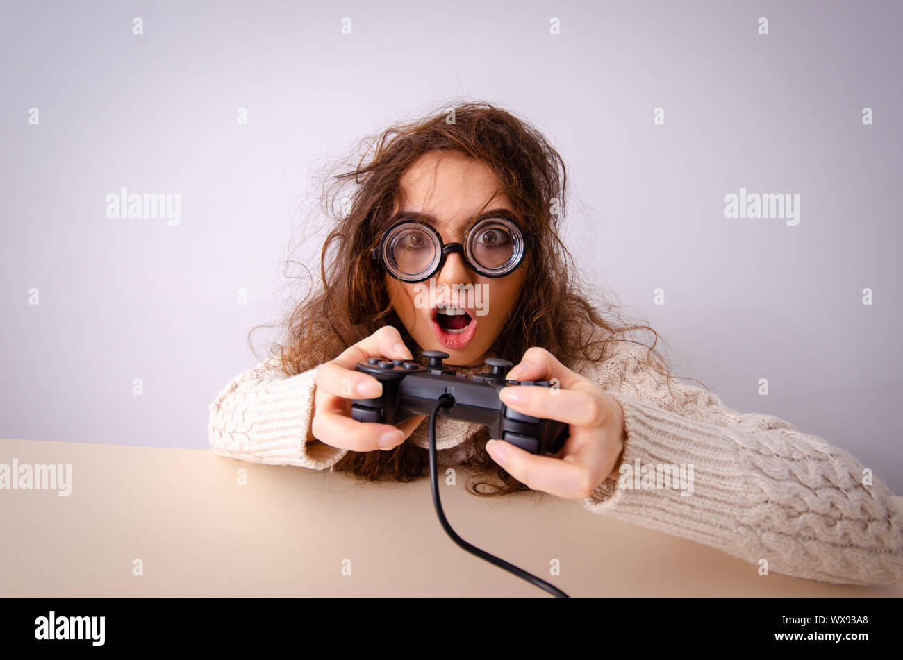 Funny nerd girl working on computer Stock Photo - Alamy