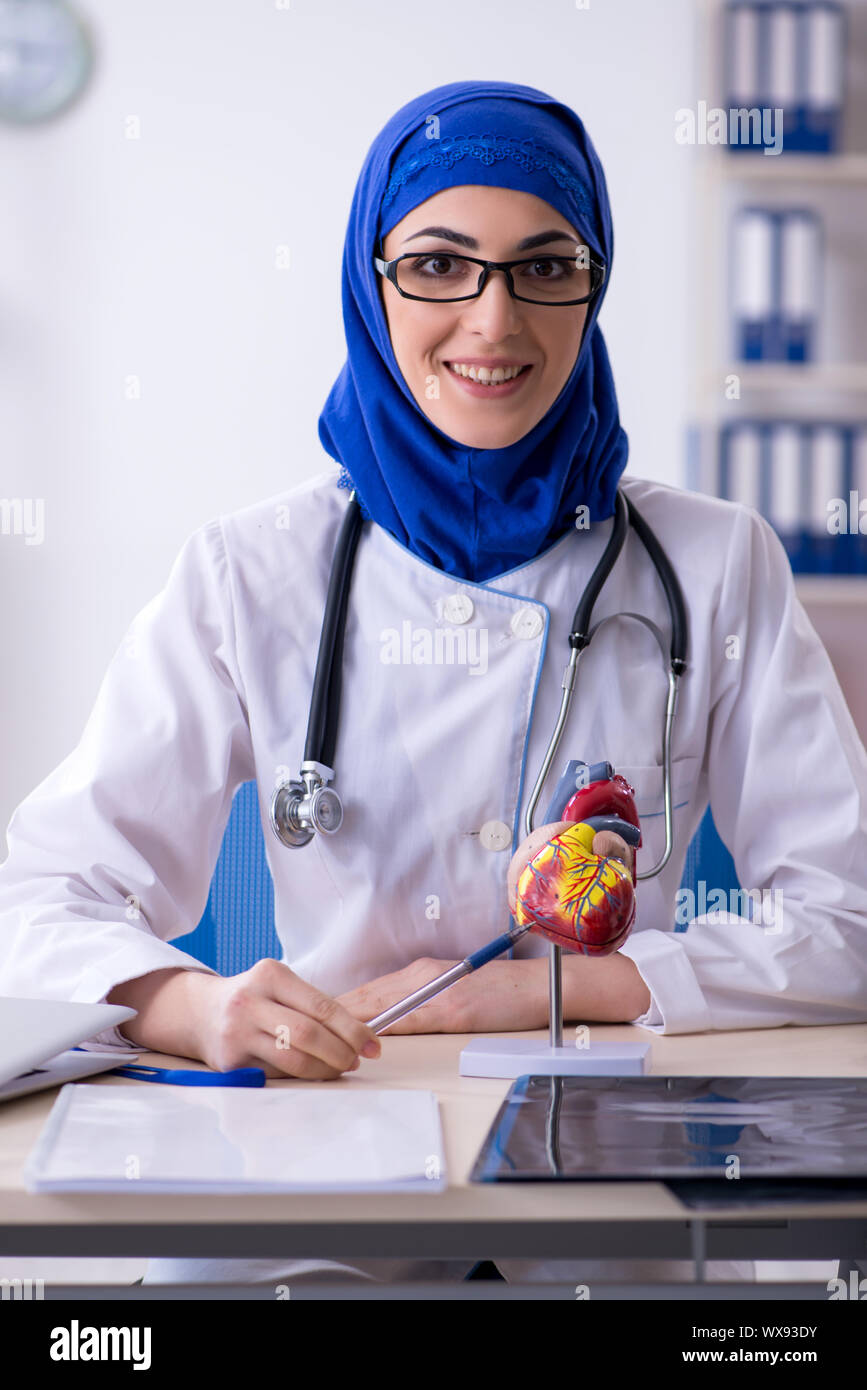 Arab female doctor working in the clinic Stock Photo - Alamy