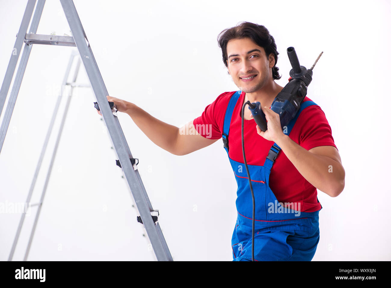 Young handsome contractor working hi-res stock photography and images ...