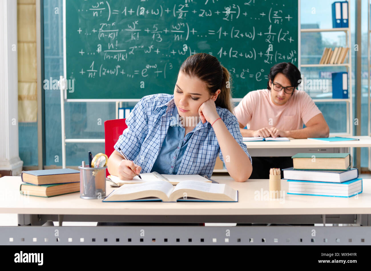 Young students taking the math exam in classroom Stock Photo - Alamy