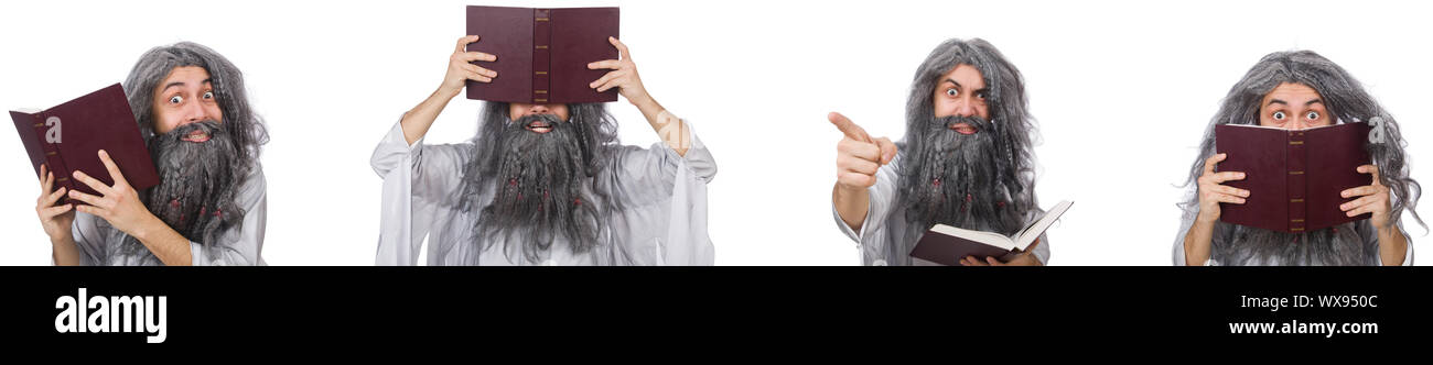 Funny old wizard with book Stock Photo - Alamy