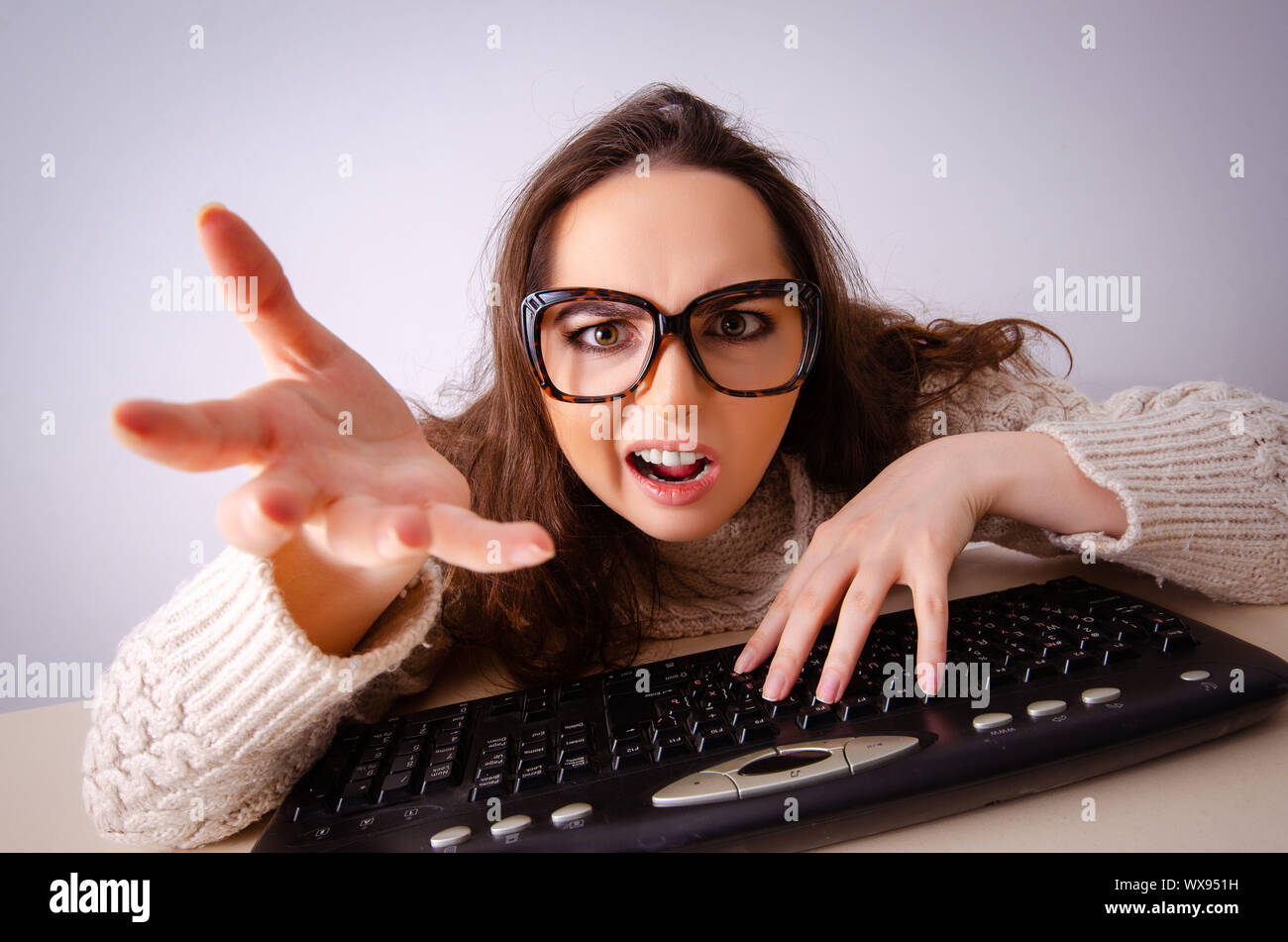 Funny nerd girl working on computer Stock Photo - Alamy Funny nerd girl working on computer Stock Photo - Alamy