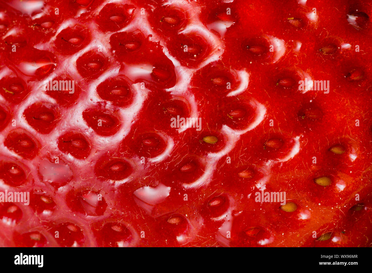 Strawberry texture extreme close up Stock Photo - Alamy