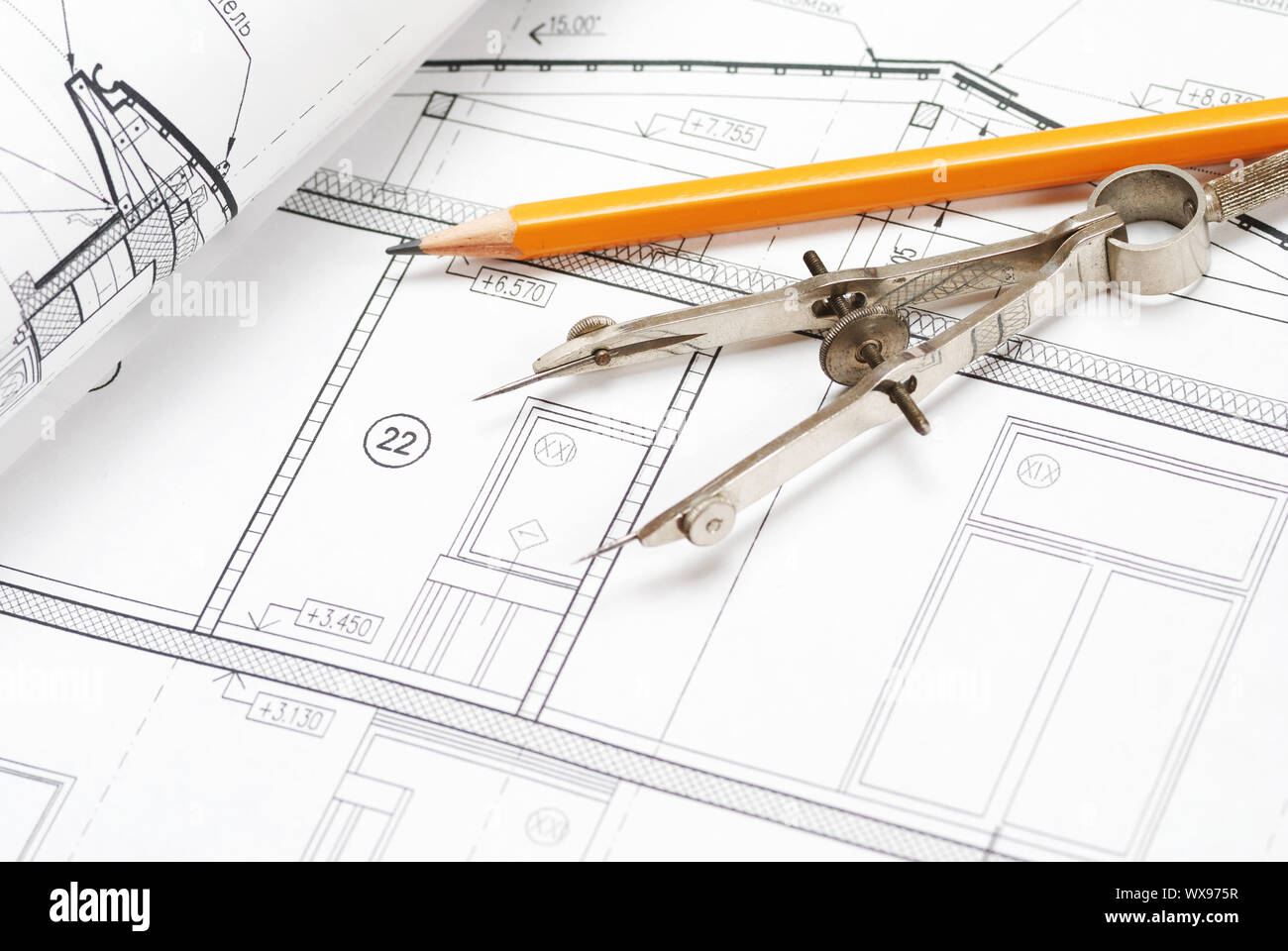 Tools over house plan blueprints Stock Photo - Alamy