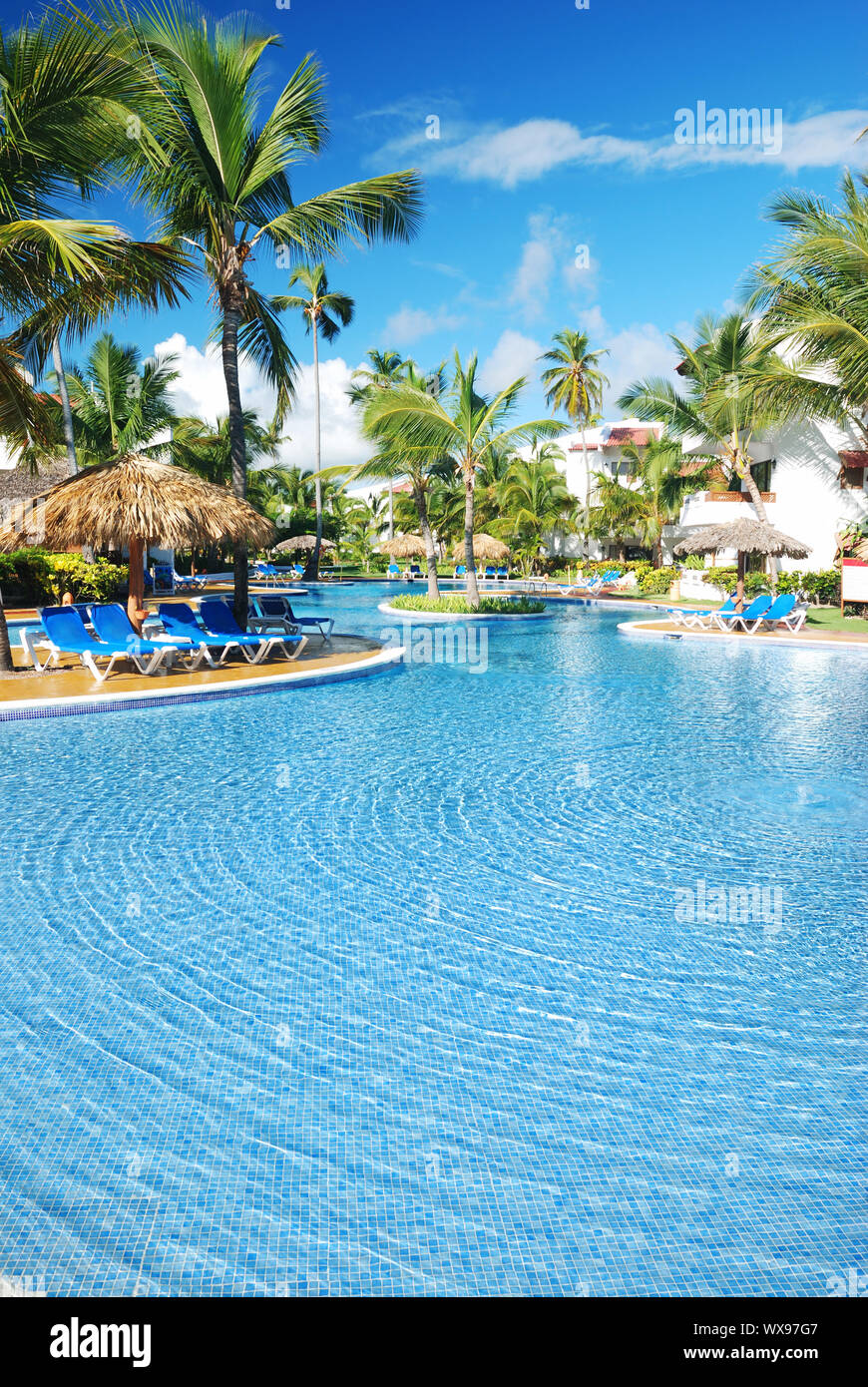 Swimming pool in the tropical hotel Stock Photo - Alamy