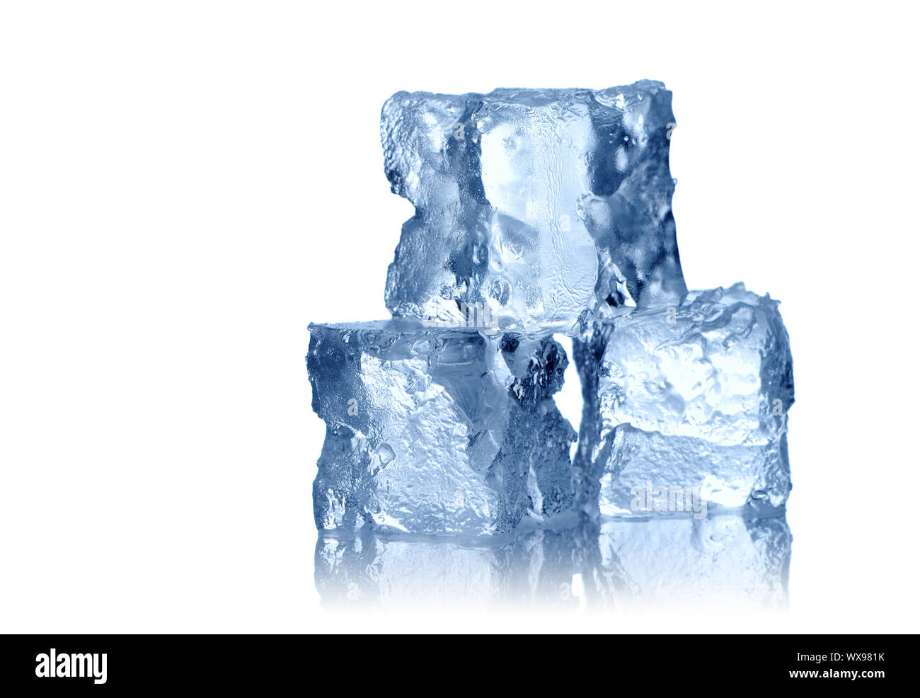 Ice cubes isolated on white background. Soft reflection Stock Photo - Alamy